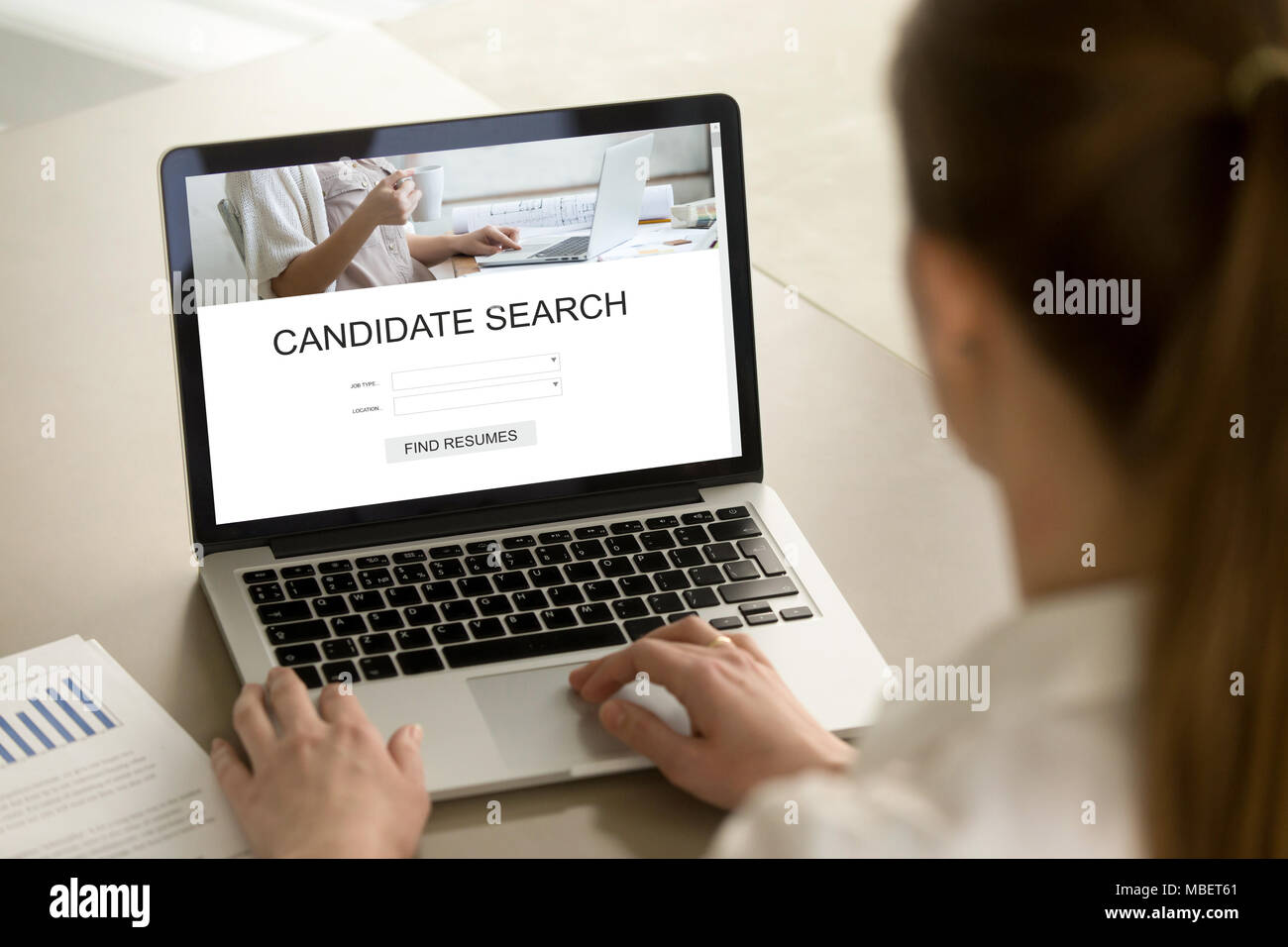 Young businesswoman searching for job candidate using search engine on ...