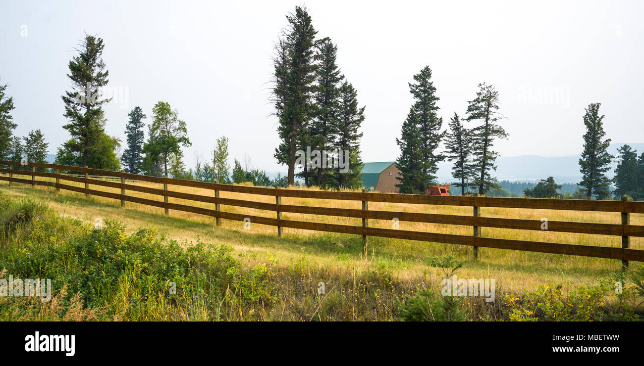 Fence in field, Golden, British Columbia, Canada Stock Photo - Alamy