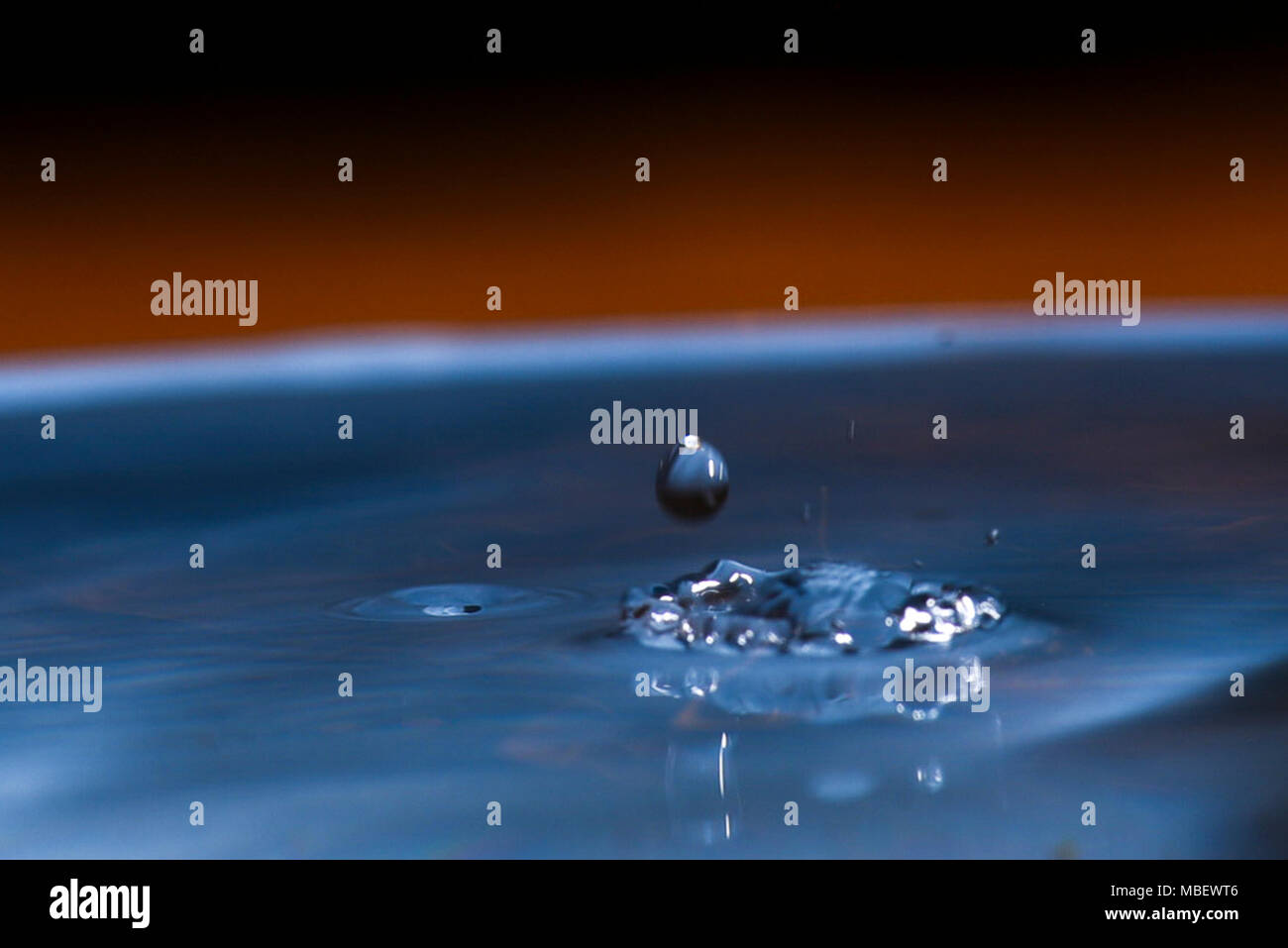 Close-up of drop falling into water, Kenora, Lake of the Woods, Ontario ...