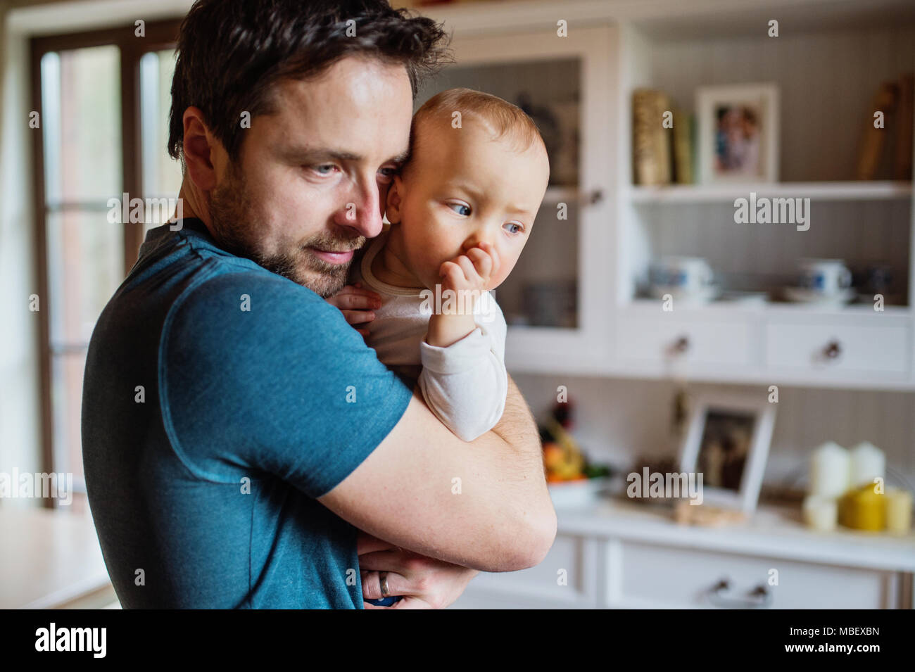 Father with a baby girl at home. Paternity leave Stock Photo - Alamy