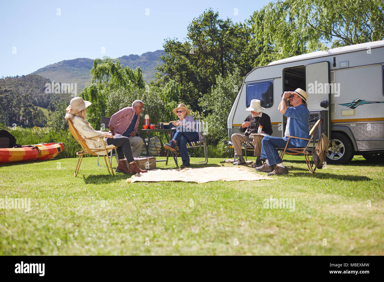 Man relaxing outside camper van hi-res stock photography and images - Alamy