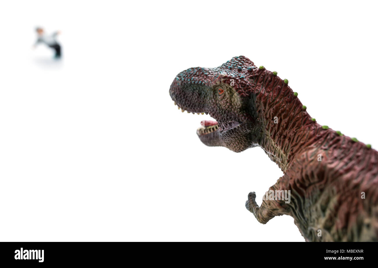 tyrannosaurus chasing a running people on white Stock Photo - Alamy