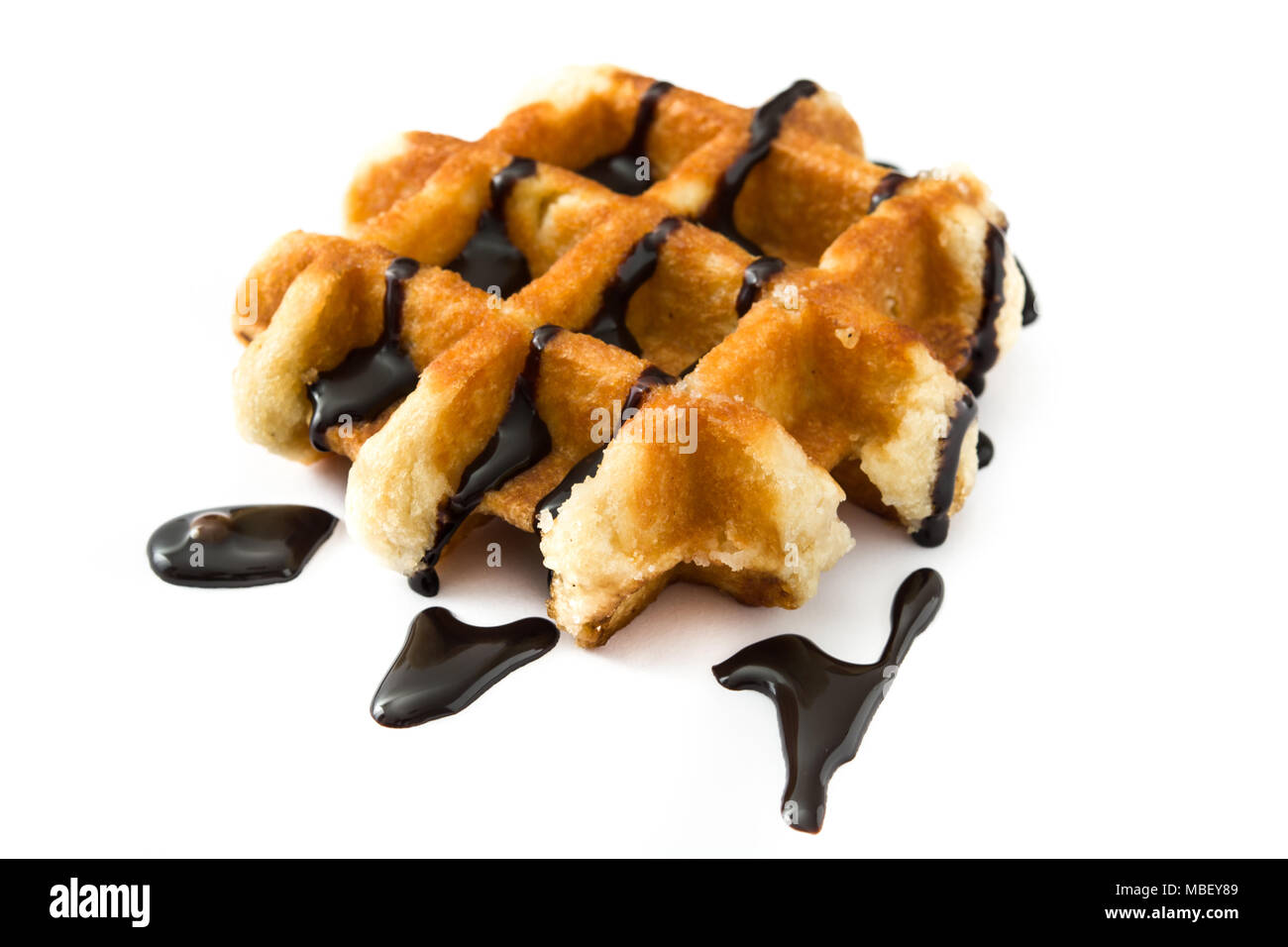 Belgian waffles with chocolate syrup isolated on white background Stock ...