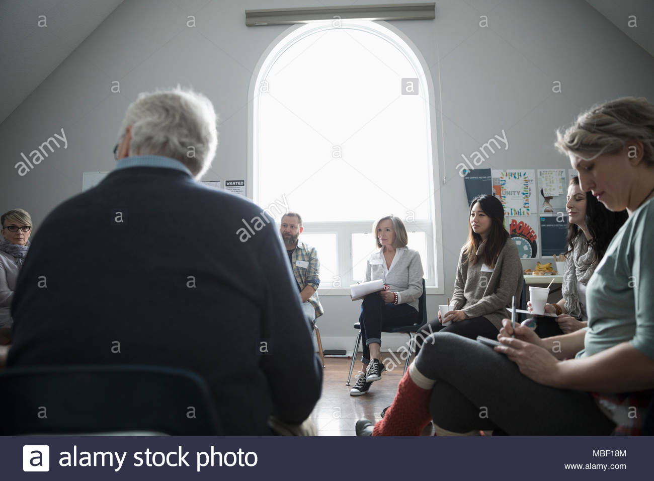 Group of people sitting talking ethnic hi-res stock photography and ...