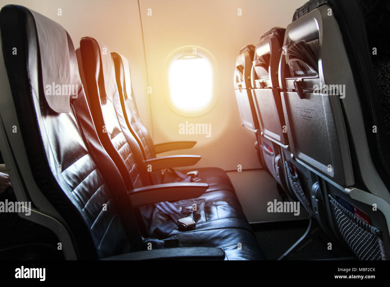 Seats of an airplane, with a window Stock Photo - Alamy