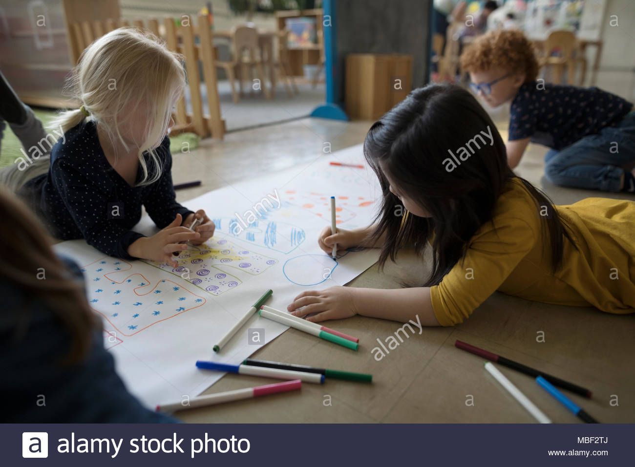 Boy coloring markers hi-res stock photography and images - Alamy