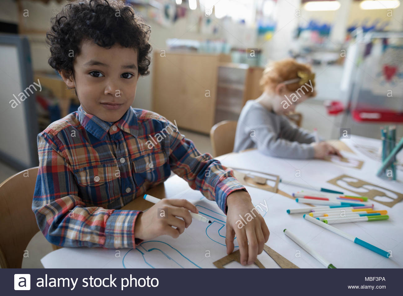 Boy coloring markers hi-res stock photography and images - Alamy