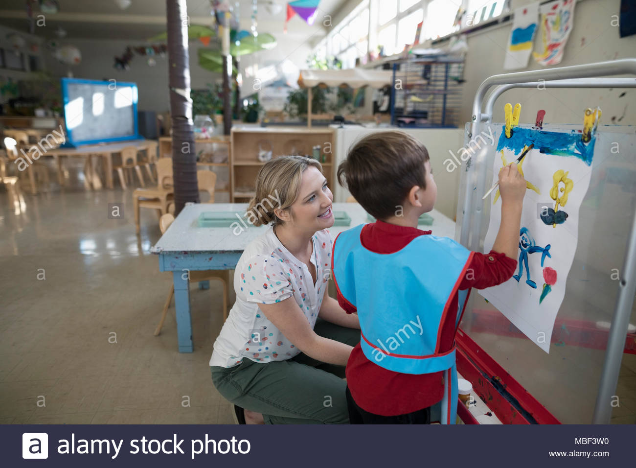 Teacher student painting in classroom hi-res stock photography and ...