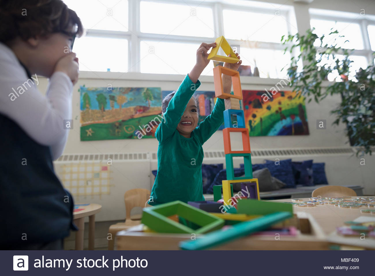 Boys using building blocks hi-res stock photography and images - Alamy