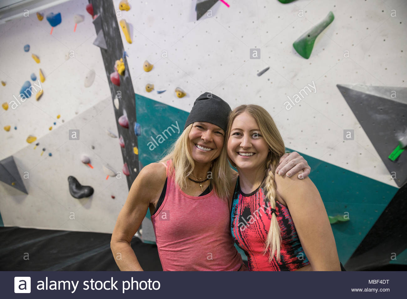 Happy climber top of wall hi-res stock photography and images - Alamy