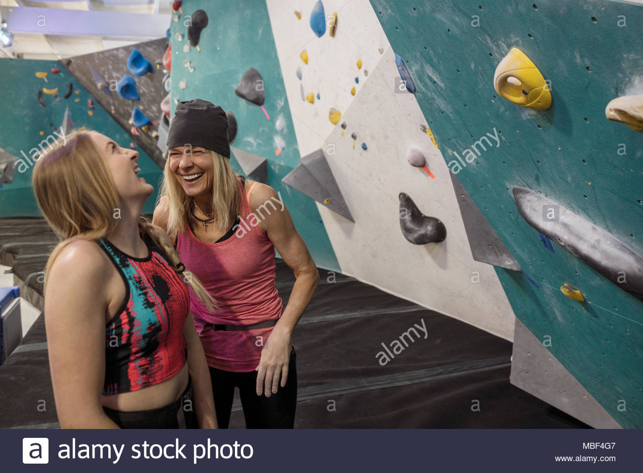 Happy climber top of wall hi-res stock photography and images - Alamy