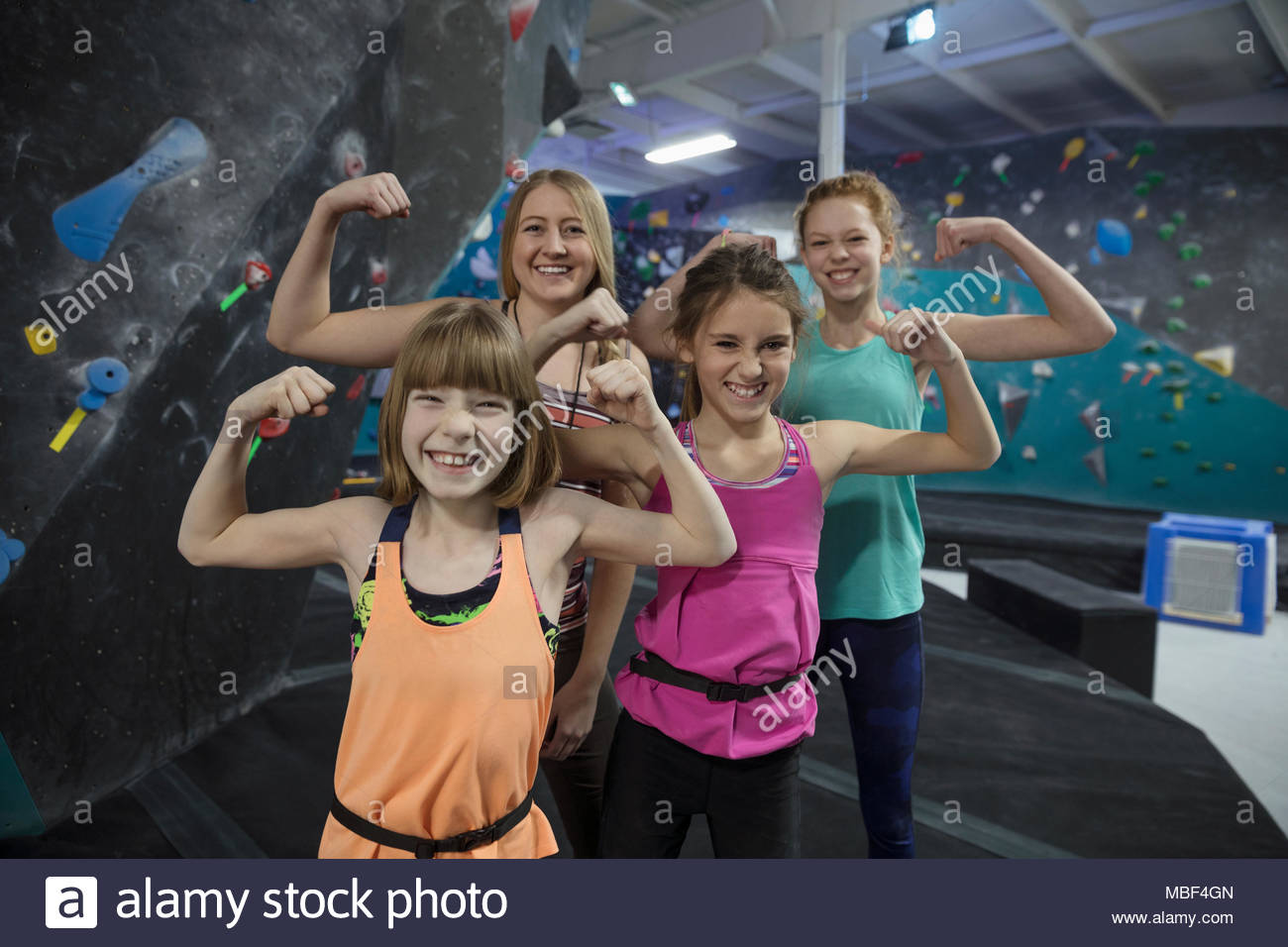 Girls flexing hi-res stock photography and images - Alamy