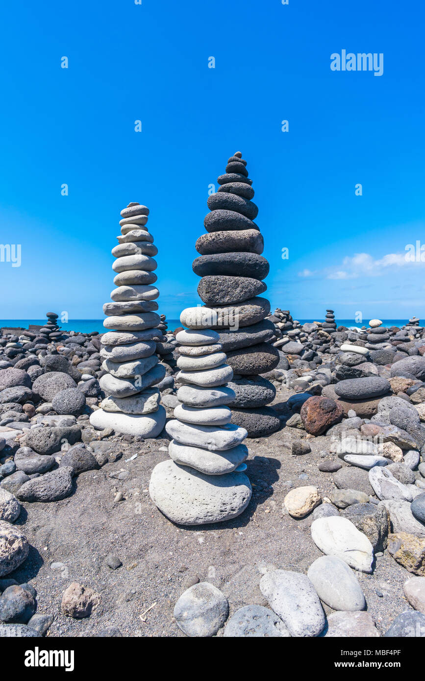 Stacks of stones on the beach in Puerto de la Cruze, Tenerife Stock ...
