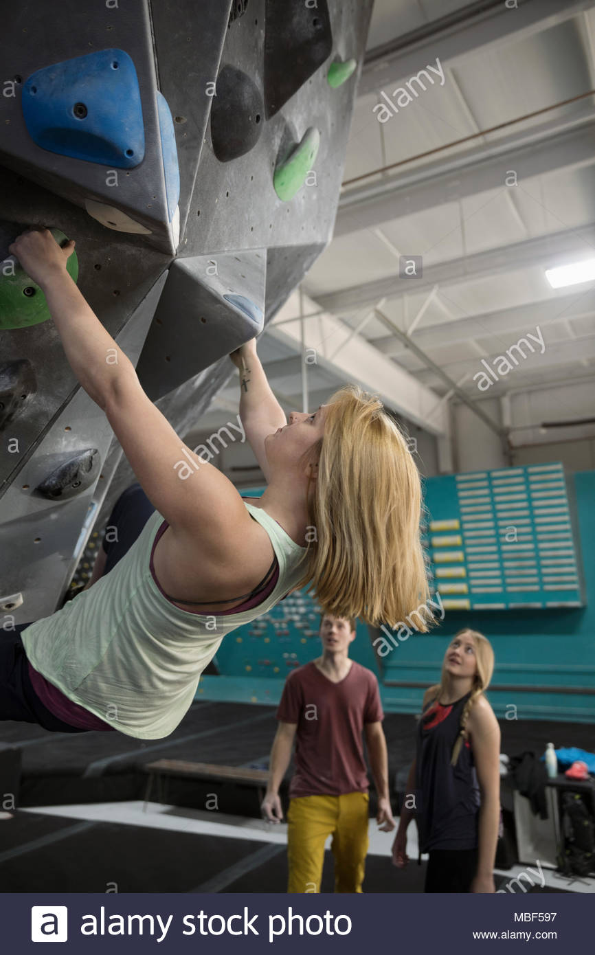 Woman climbing wall hi-res stock photography and images - Alamy