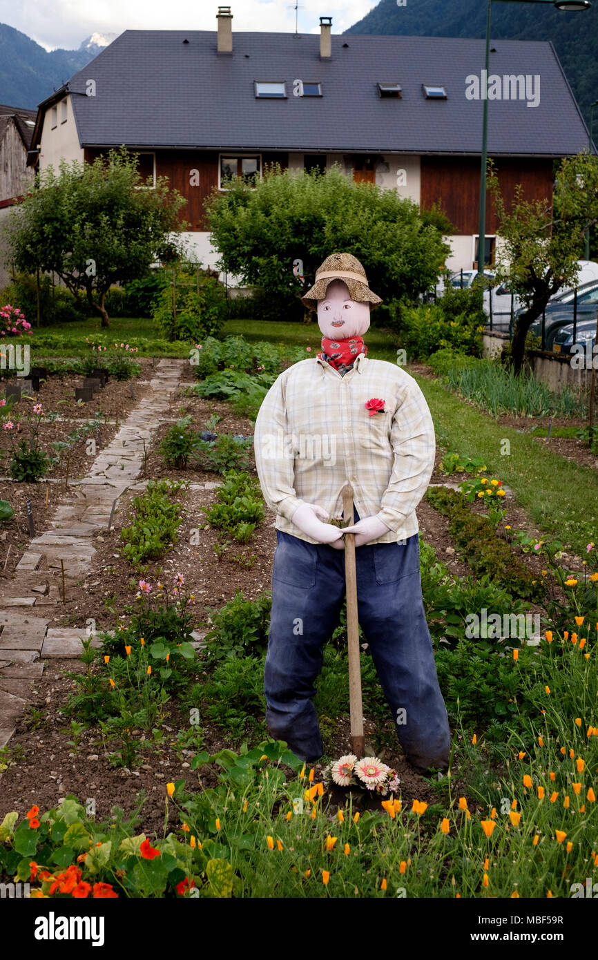 Smartly dressed male scarecrow in a rural garden Lake Annecy France ...