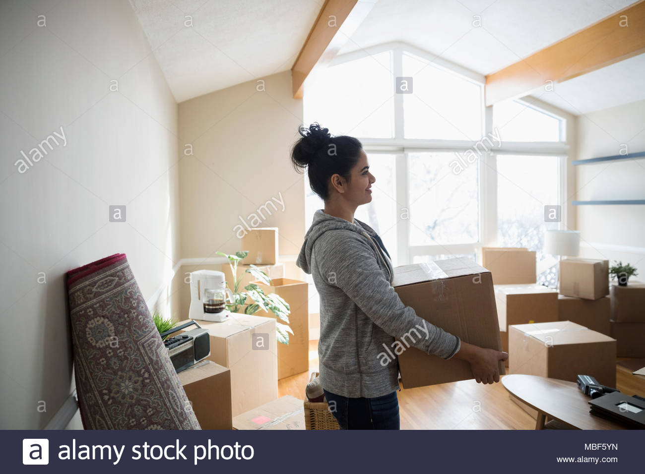 Woman moving house real hi-res stock photography and images - Alamy