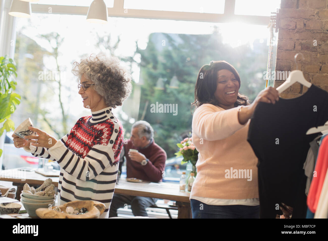 Customer shopping in a clothing store hi-res stock photography and ...