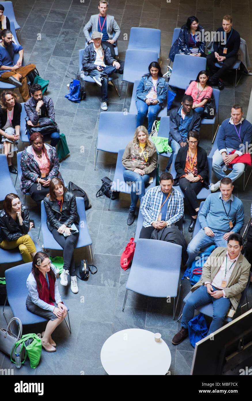 Overhead view audience watching video conference Stock Photo - Alamy