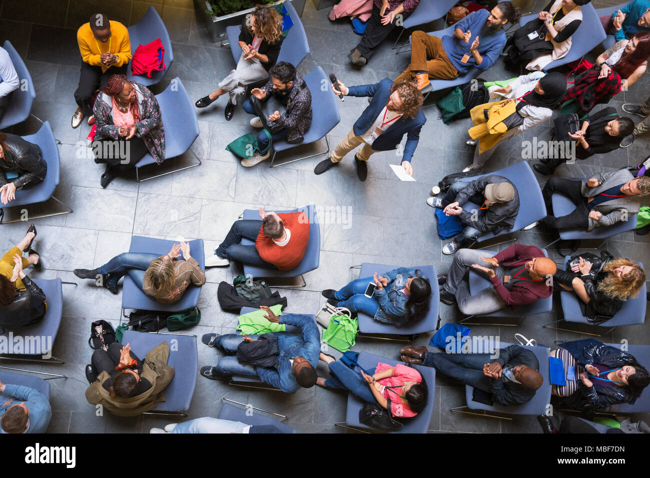 Overhead view speaker and audience at conference Stock Photo - Alamy