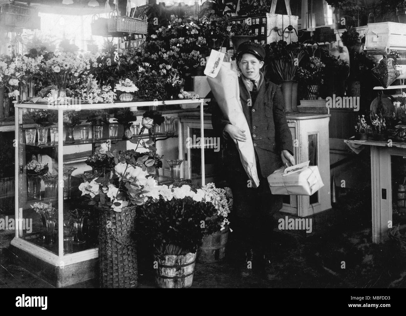 Delivering Bundles of Flowers Stock Photo - Alamy