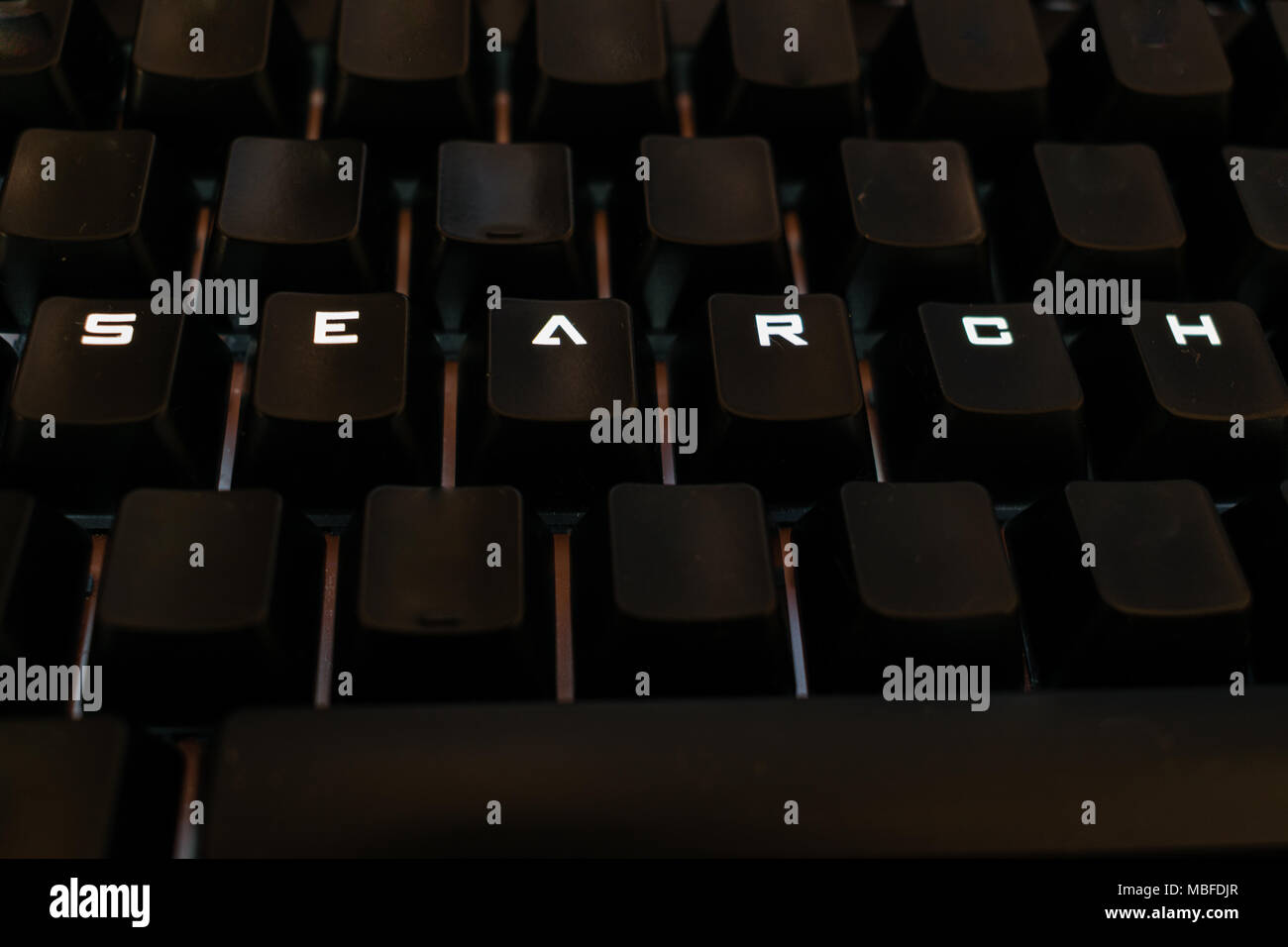 Search word on keyboard with rearranged letters, backlit keys Stock ...