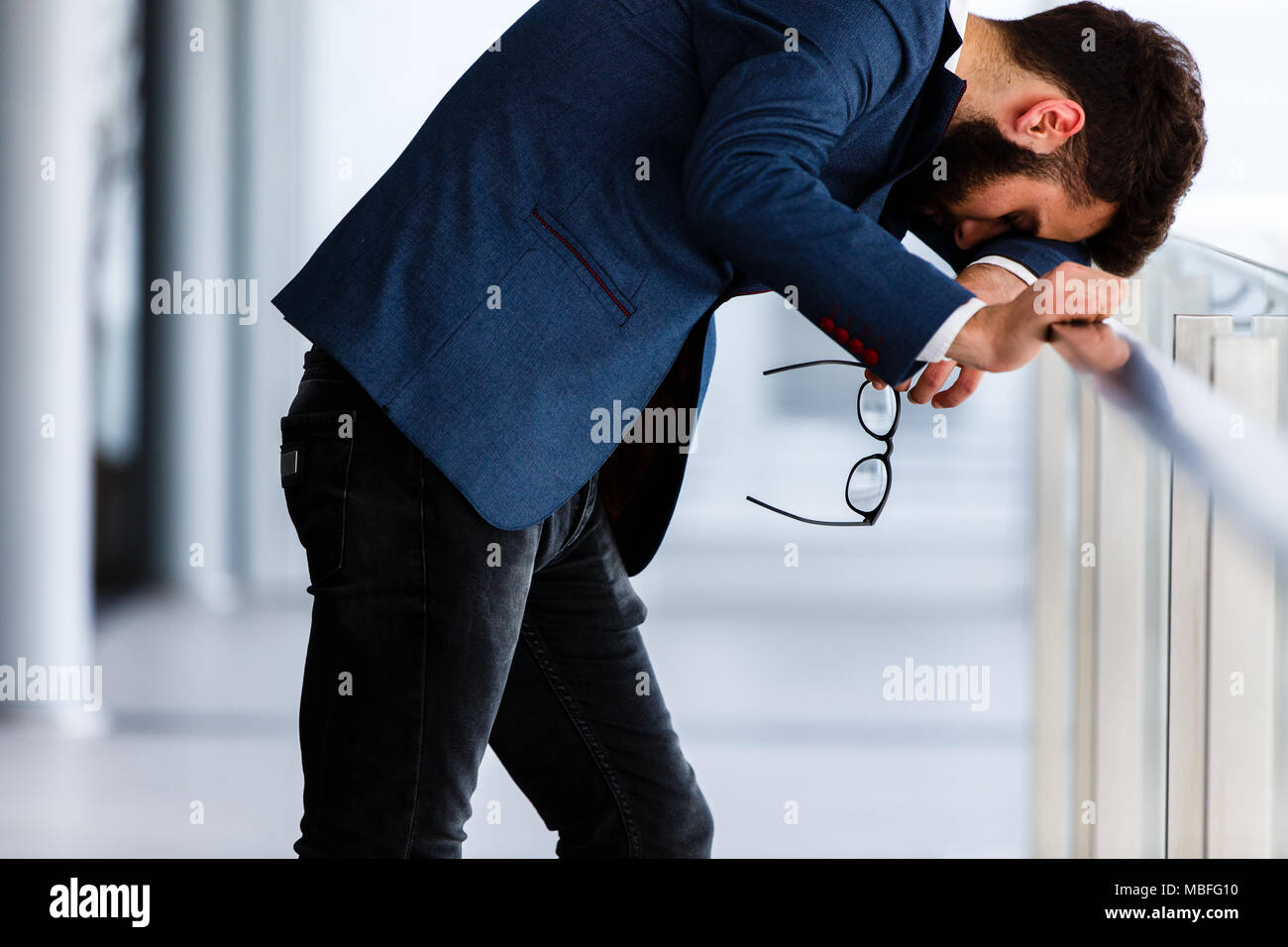 Depressed and sad man on hes job having problems Stock Photo - Alamy