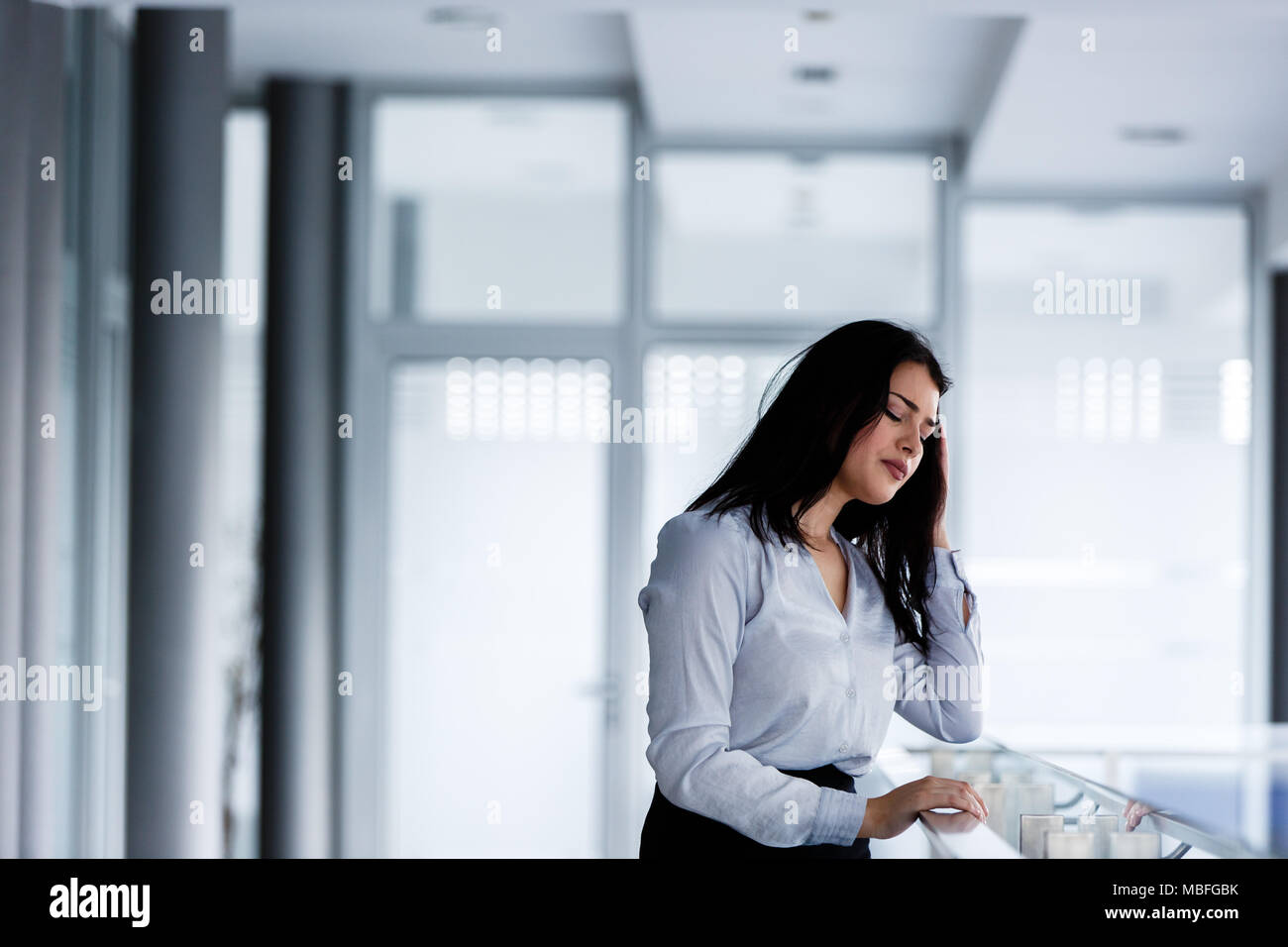 Depressed and sad girl having problems on her job Stock Photo - Alamy