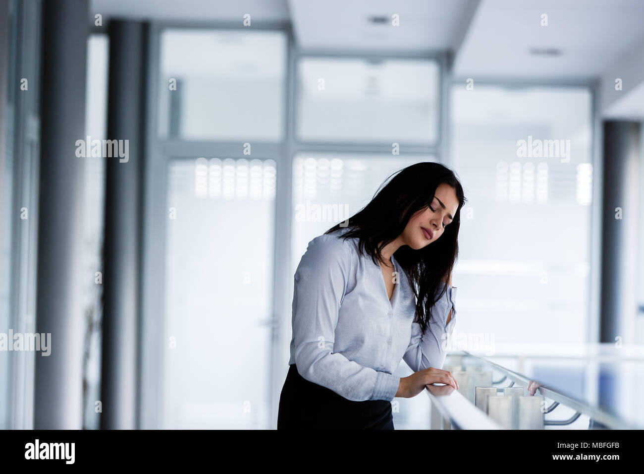Depressed and sad girl having problems on her job Stock Photo - Alamy