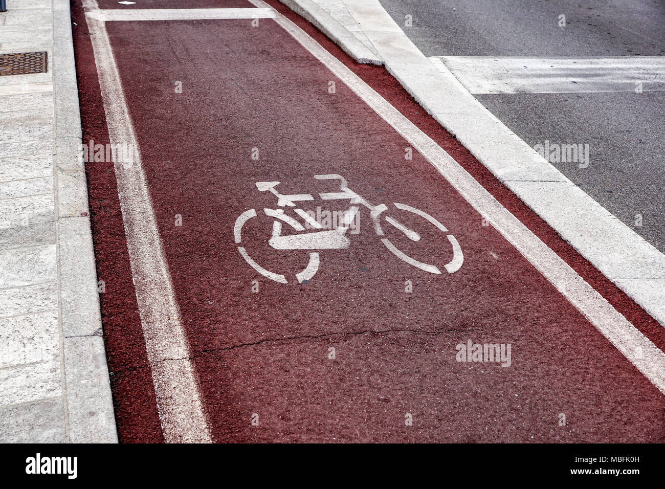 Walk way and bicycle lane signs on the asphalt road surface Stock Photo ...