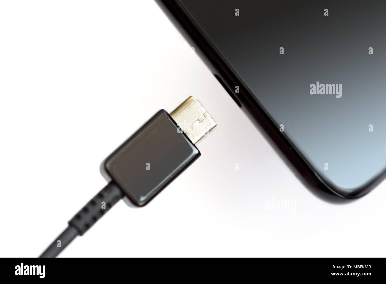 New fast USB Type-C port on mobile phone and cable Stock Photo - Alamy
