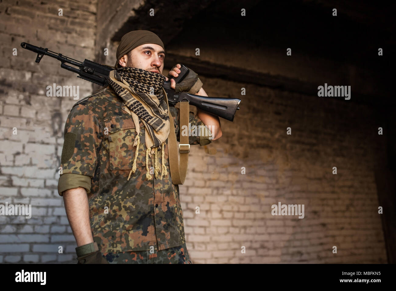 The Arab soldier with the AK-47 Kalashnikov assault rifle Stock Photo ...