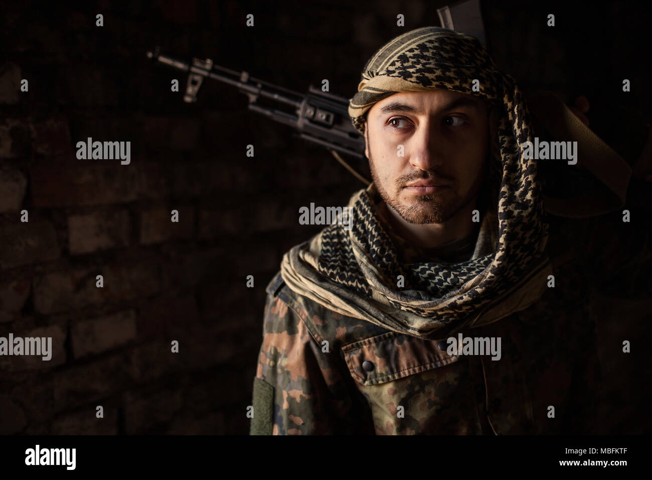 The Arab soldier with the AK-47 Kalashnikov assault rifle Stock Photo ...