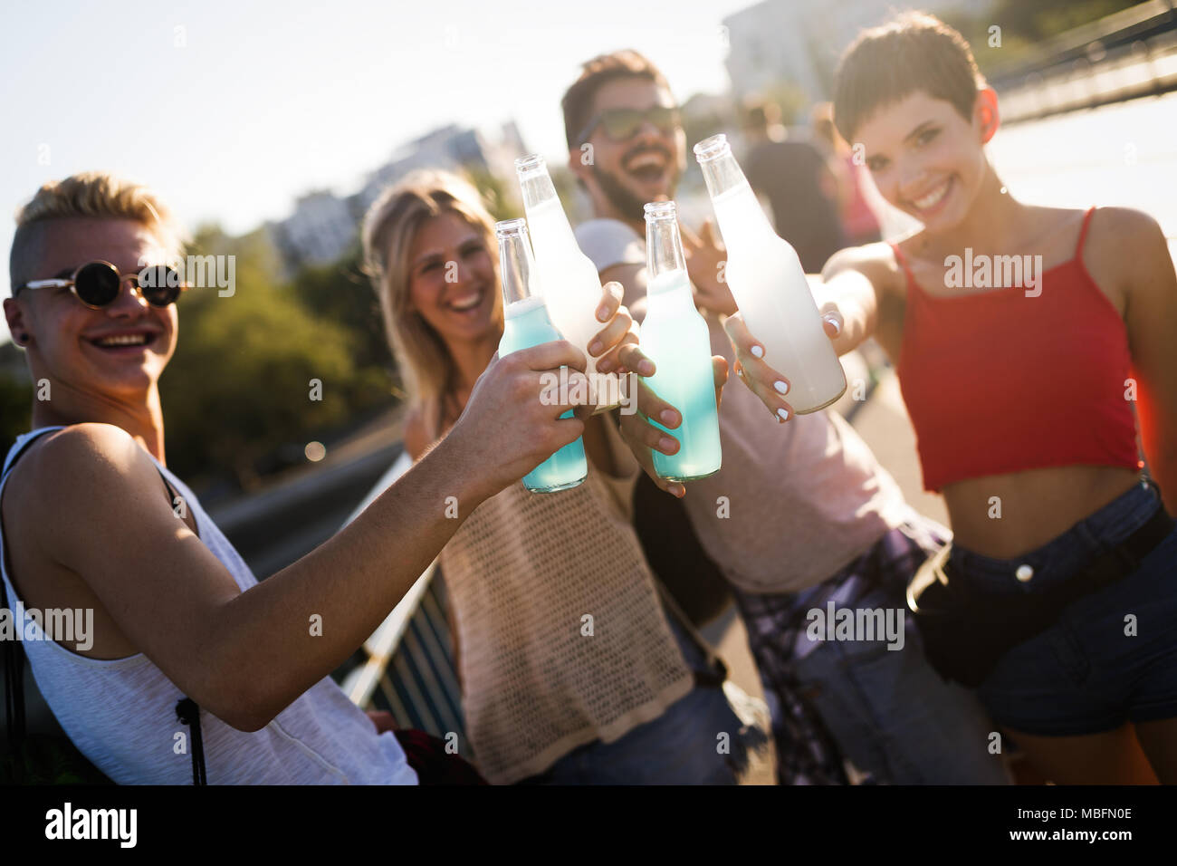 Group of young friends having fun together Stock Photo - Alamy
