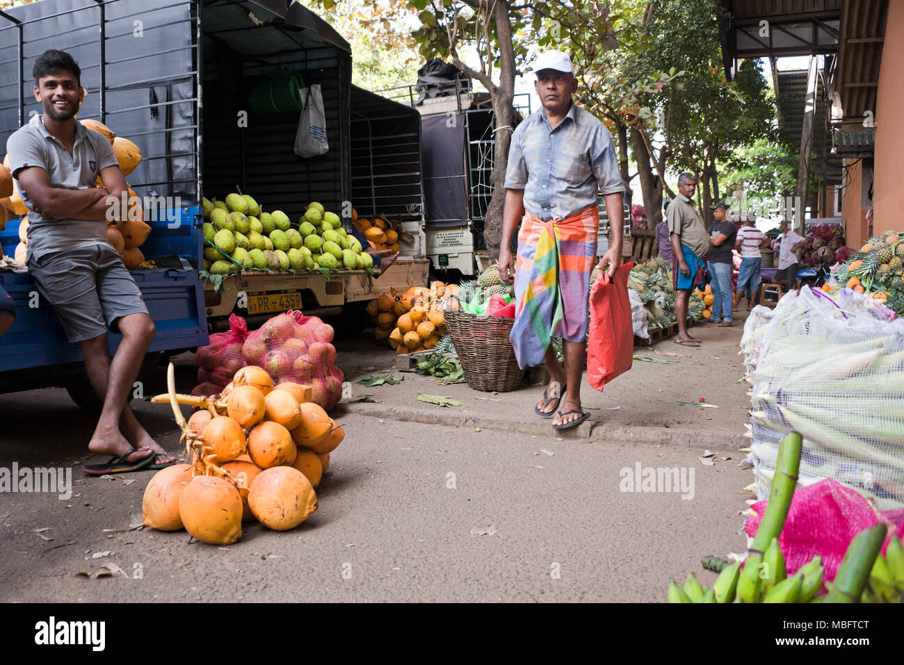 Horizontal view of delivery men at Dambulla Fruit and Vegetable ...