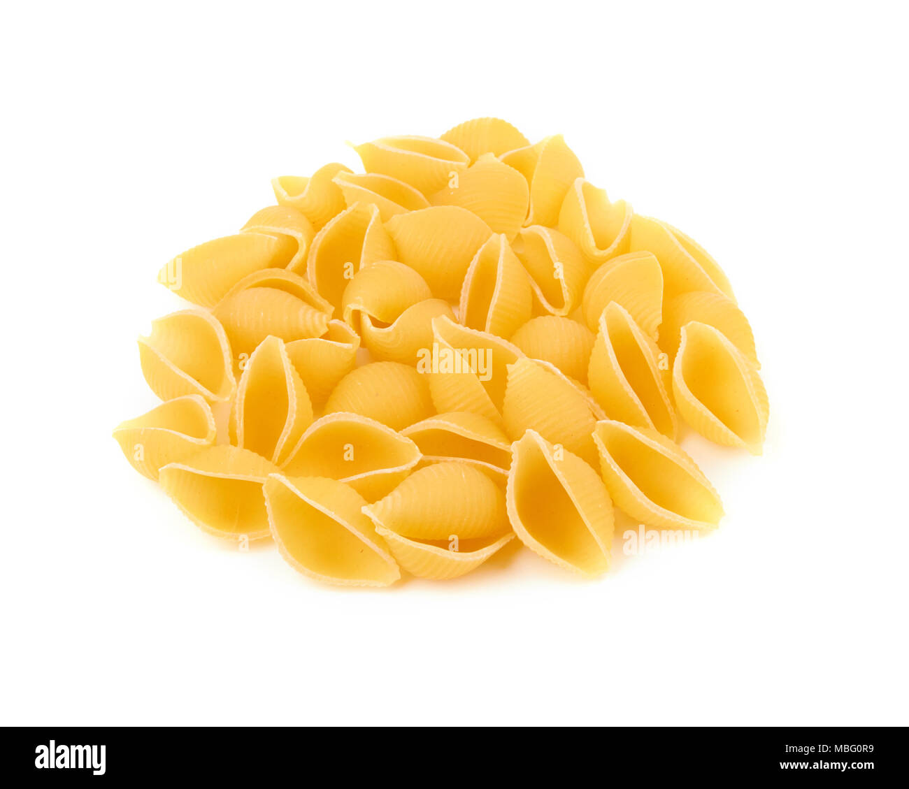 Pasta shells isolated on a white background Stock Photo - Alamy