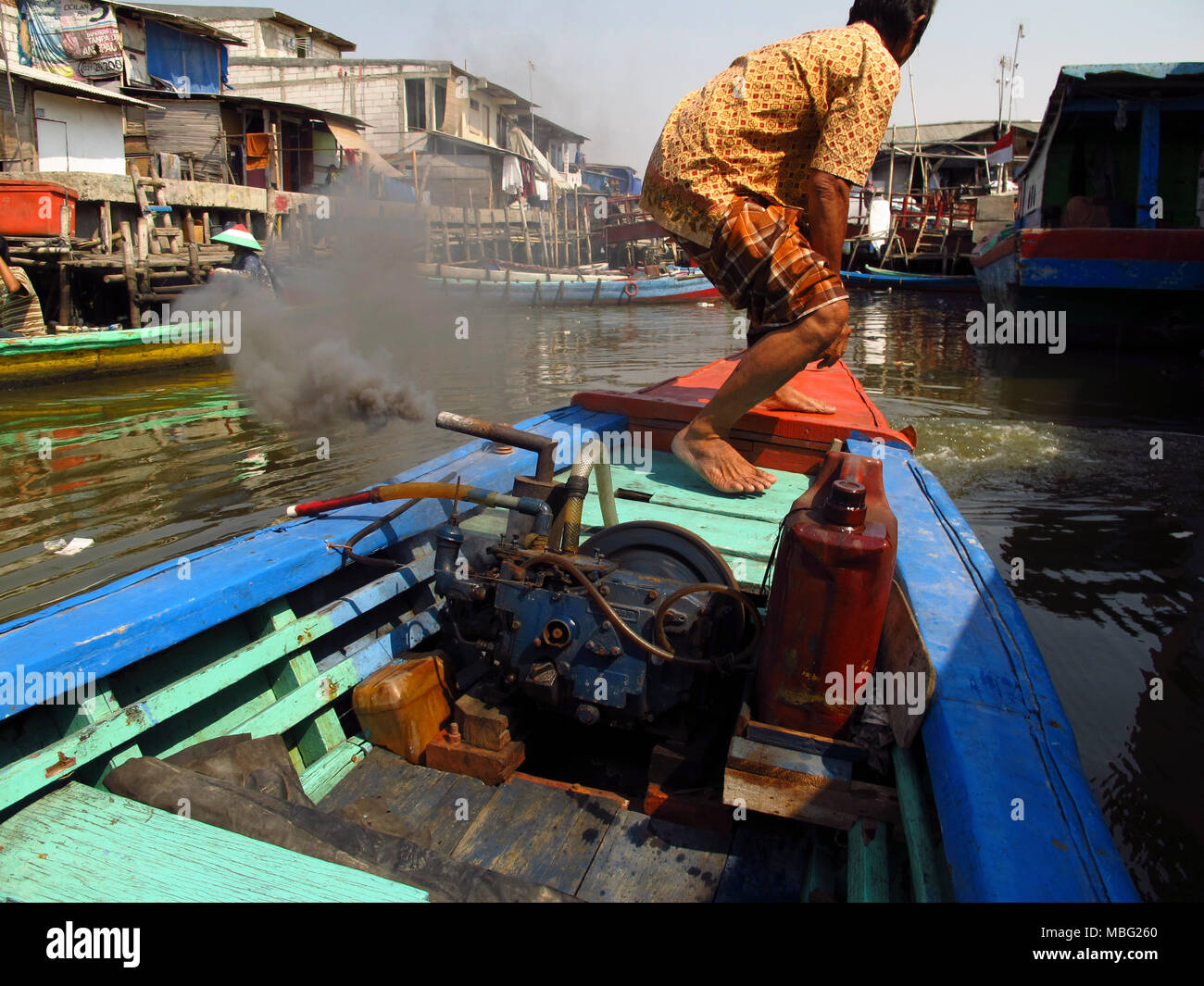 Man starting engine boat hi-res stock photography and images - Alamy