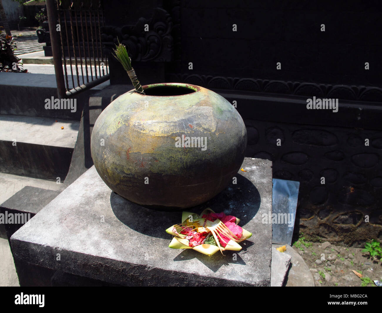 temple decoration with pot and flowers in bali Stock Photo - Alamy