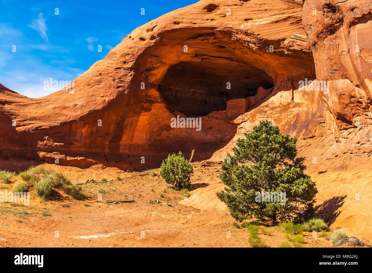 Anasazi cave dwellings built in a sandstone cliff in the Monument ...
