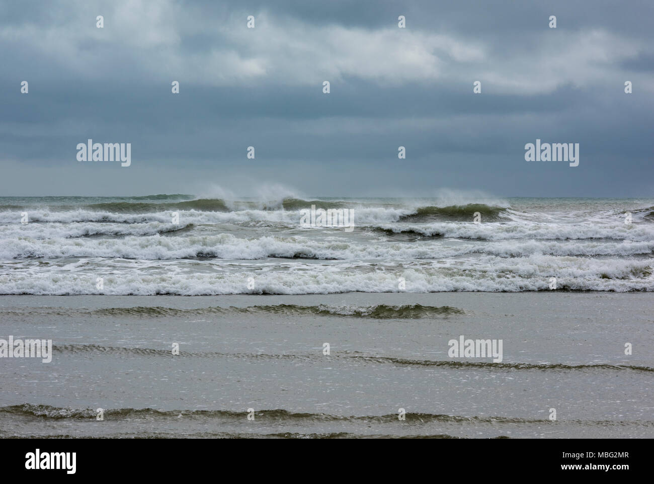Rough and stormy seas off of the beach at marazion near Penzance in ...