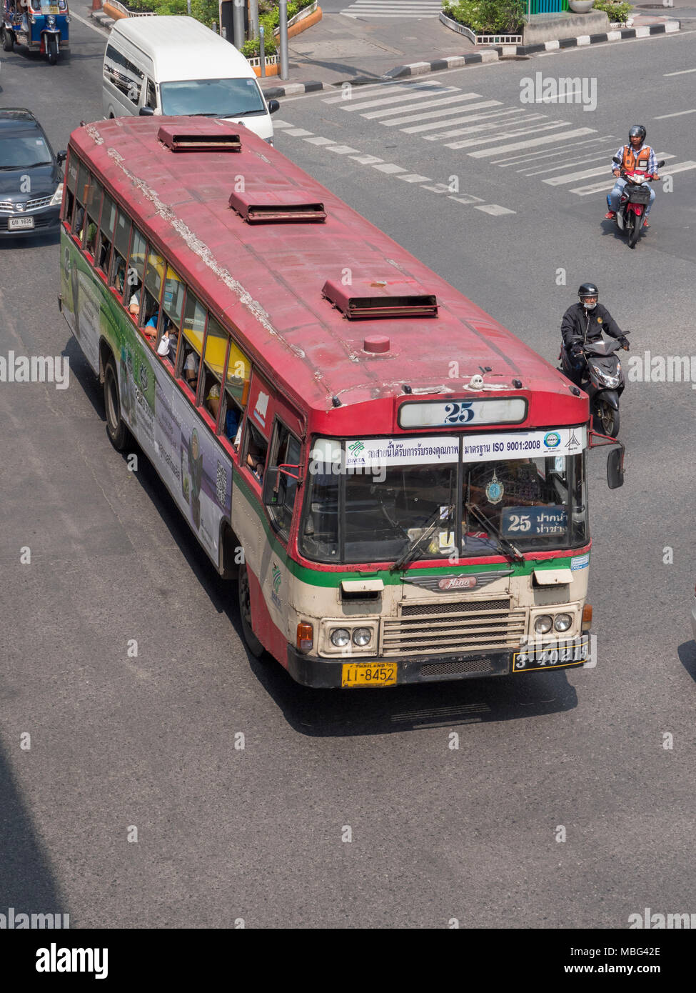 A bus carrying passengers on a road in Bangkok Thailand Asia Stock ...