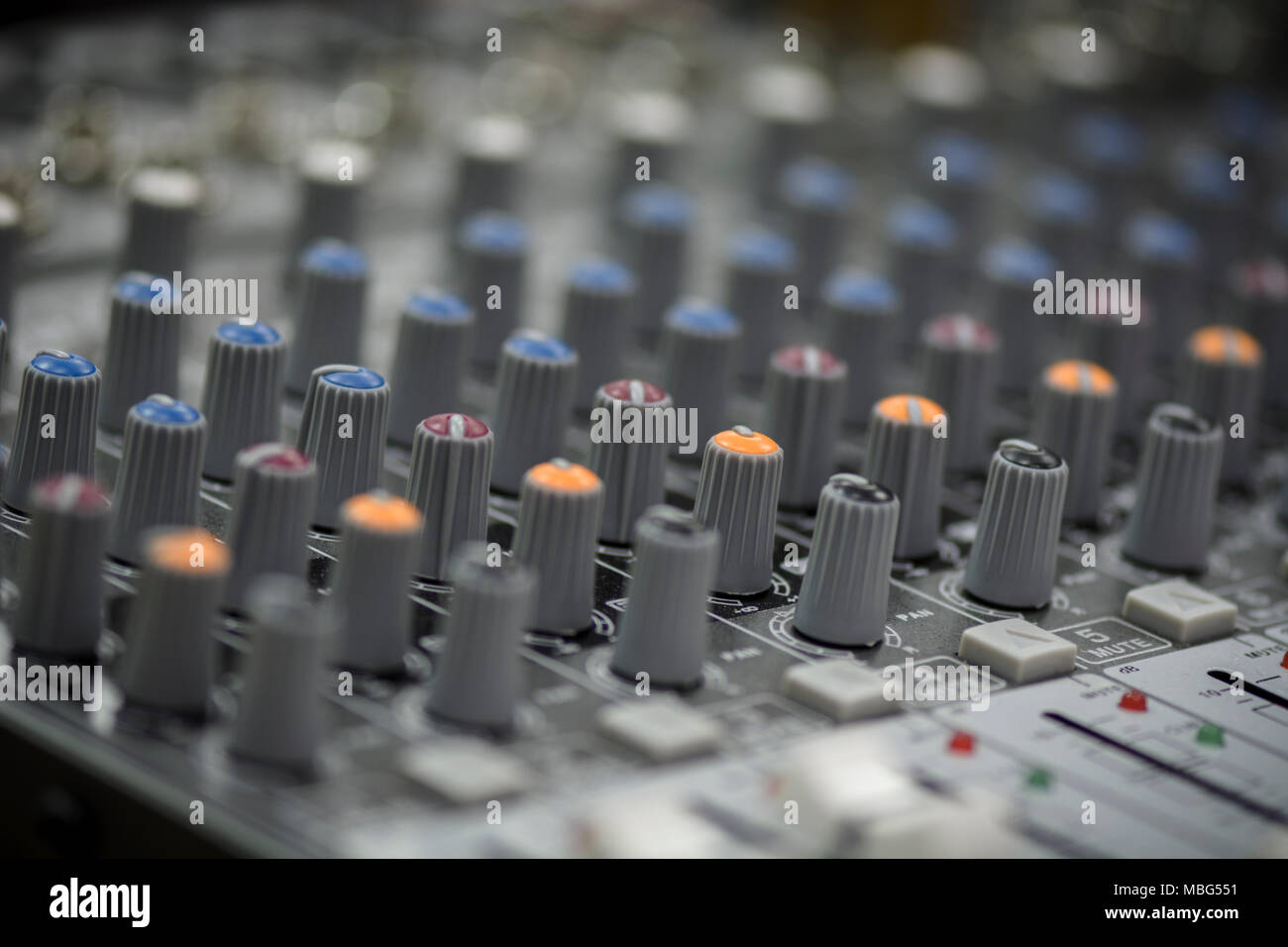 Close up of a mixing console with sliders and buttons Stock Photo - Alamy