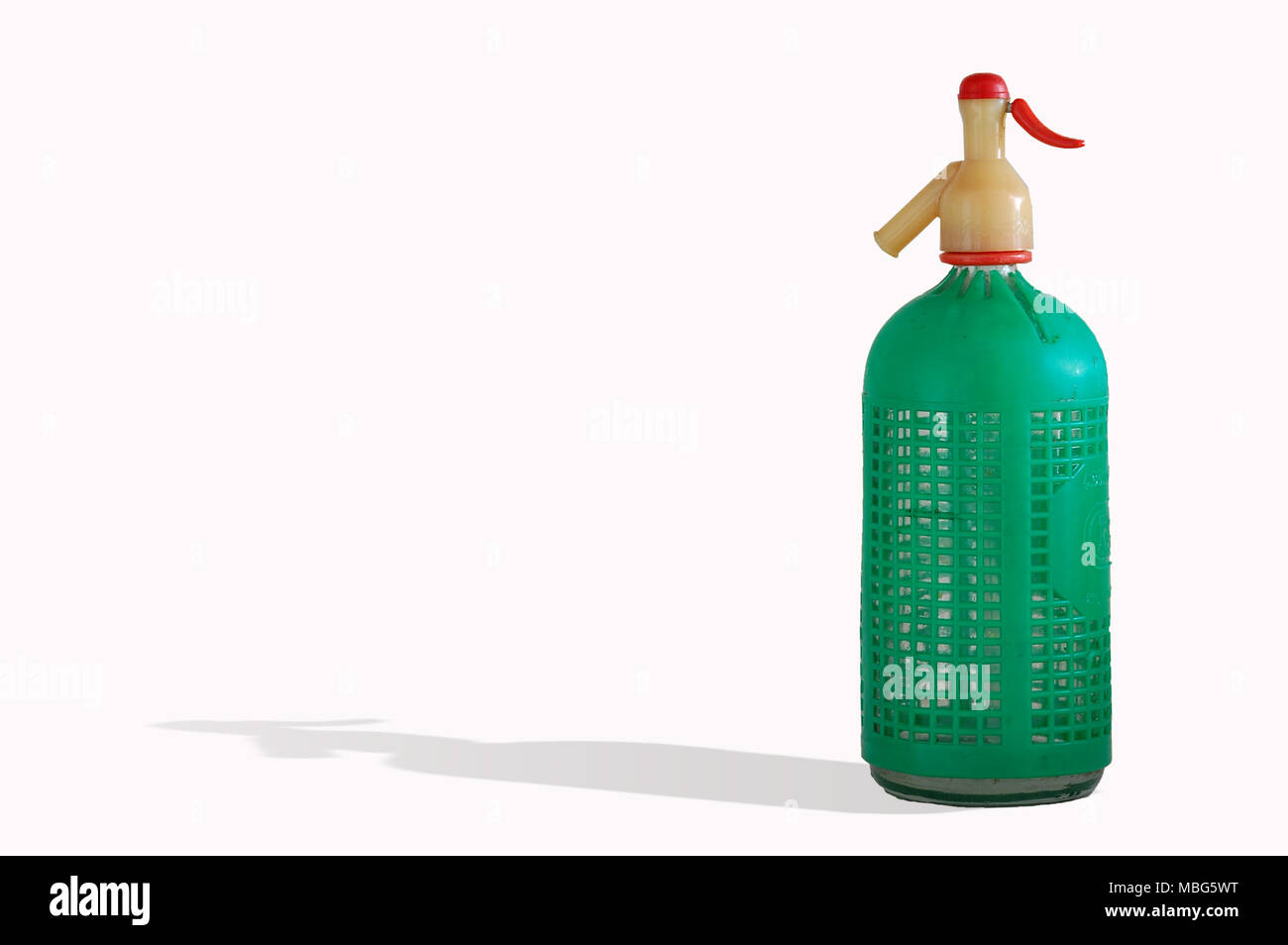 Old siphon green isolated on white background Stock Photo - Alamy