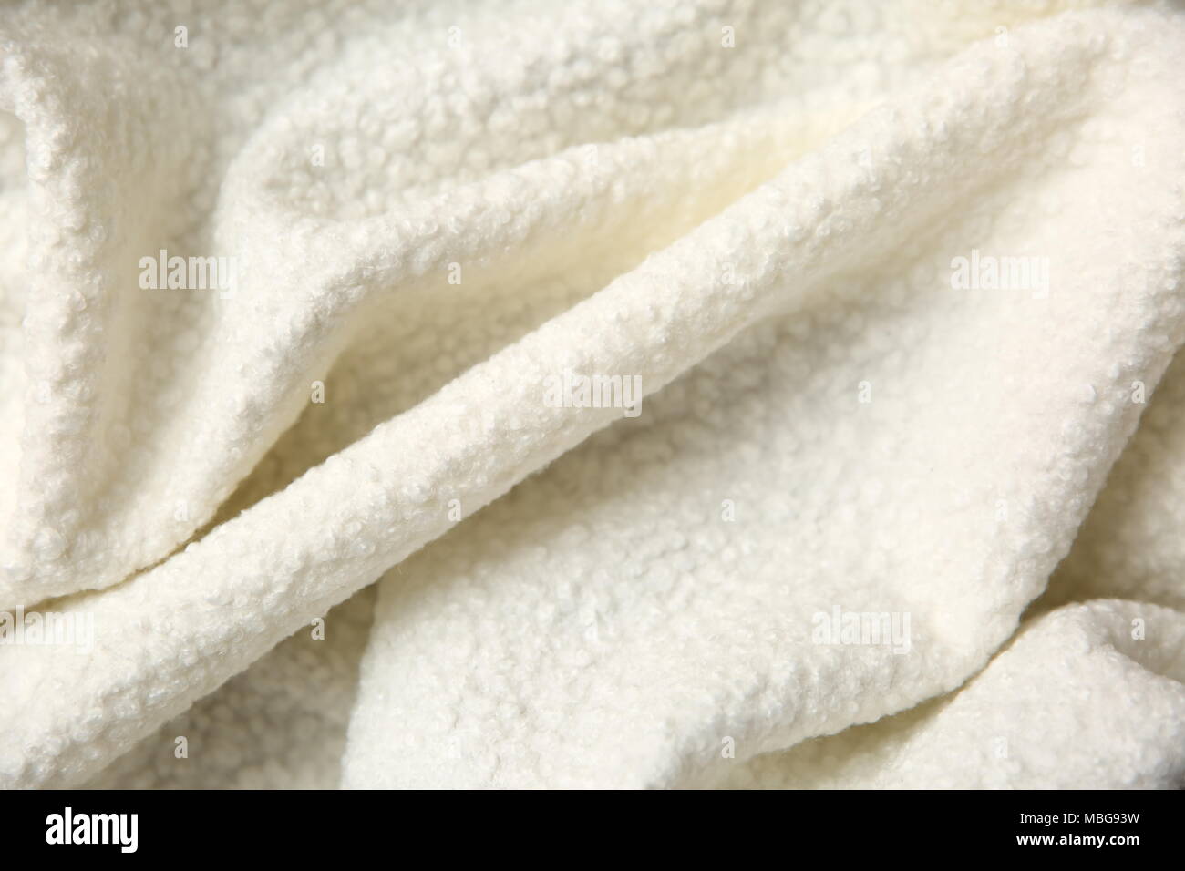 Cotton blanket with an interesting texture and crumpled irregularly in ...
