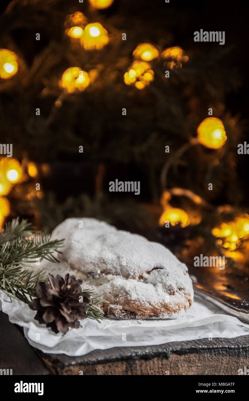 Dresden Stollen is a Traditional German Cake with raisins on a light ...