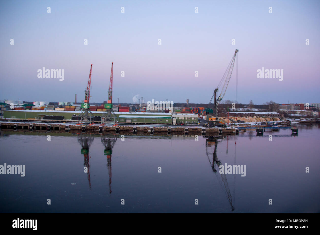 Freight shipping containers and gas oil tanks at the docks. in import ...