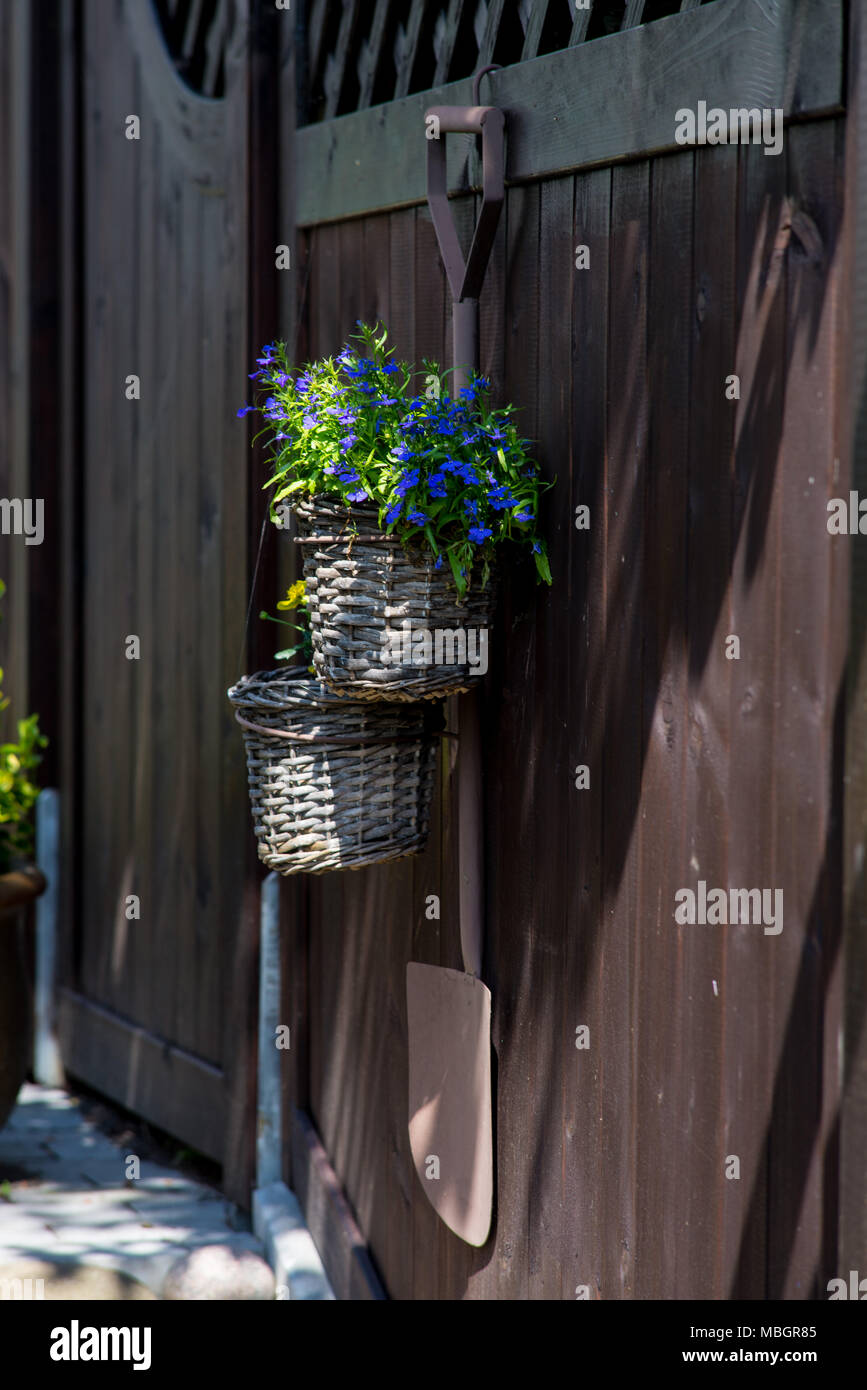 Hanging flower pots fence hi-res stock photography and images - Alamy