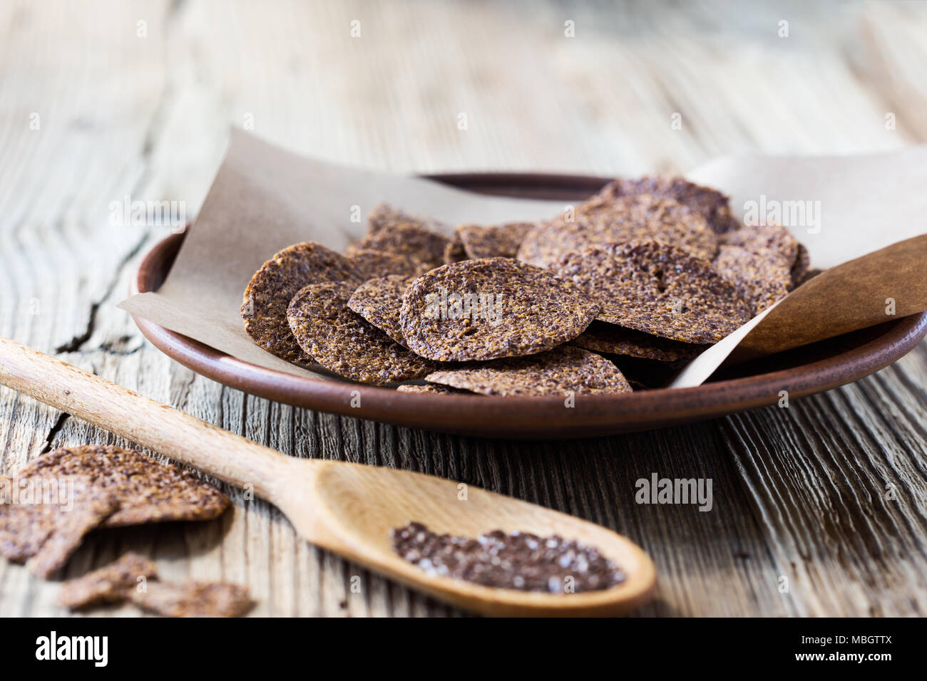 Healthy chips with flax seeds and linseeds, natural vegetarian snack on ...