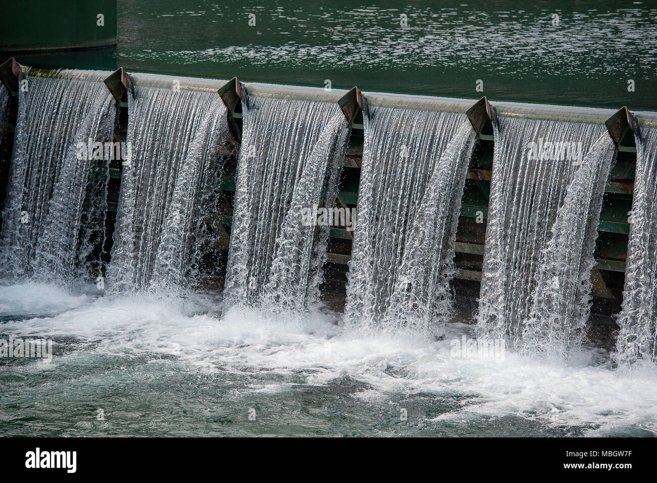 overflow of water in a hydroelectric plant Stock Photo - Alamy