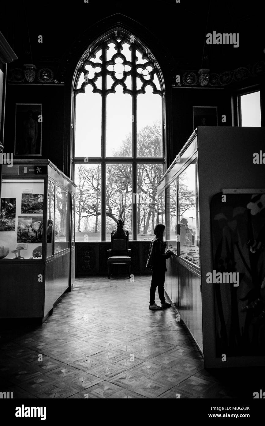 A young girl looking at Exhibits inside Cliffe Castle Museum, Keighley ...