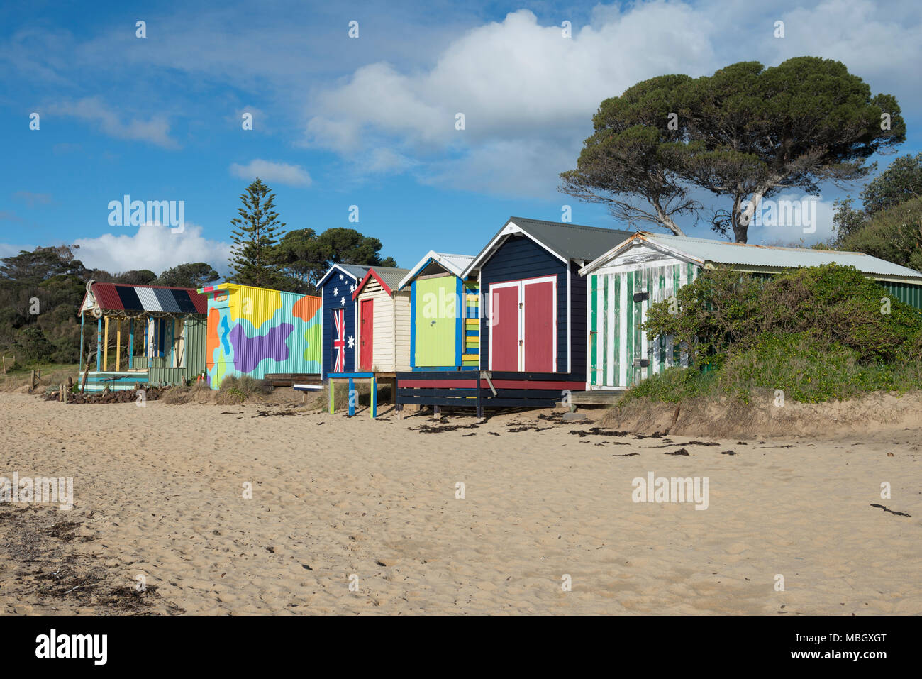 Colourful bathing huts on Mills Beach at Mornington on the Mornington ...